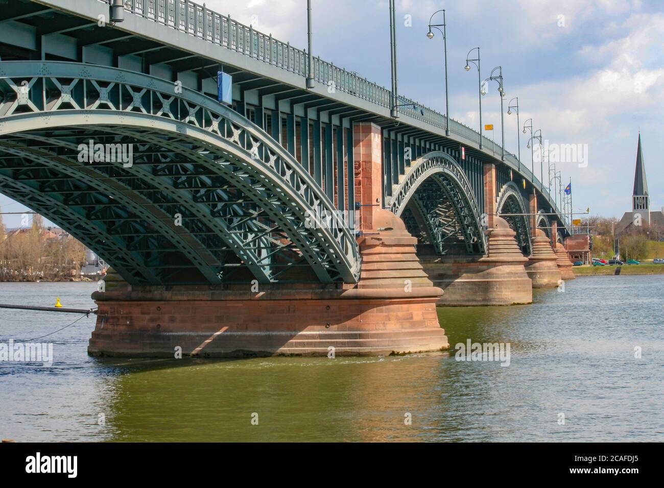 View of arc bridge above the lake with a cloudy sky background Stock ...