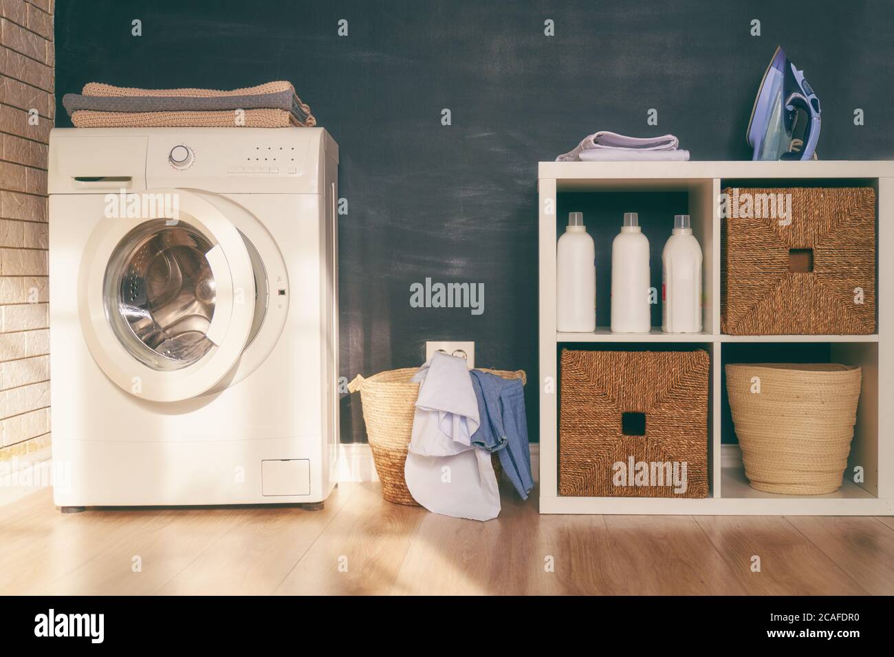 Interior of a real laundry room with a washing machine at home Stock ...