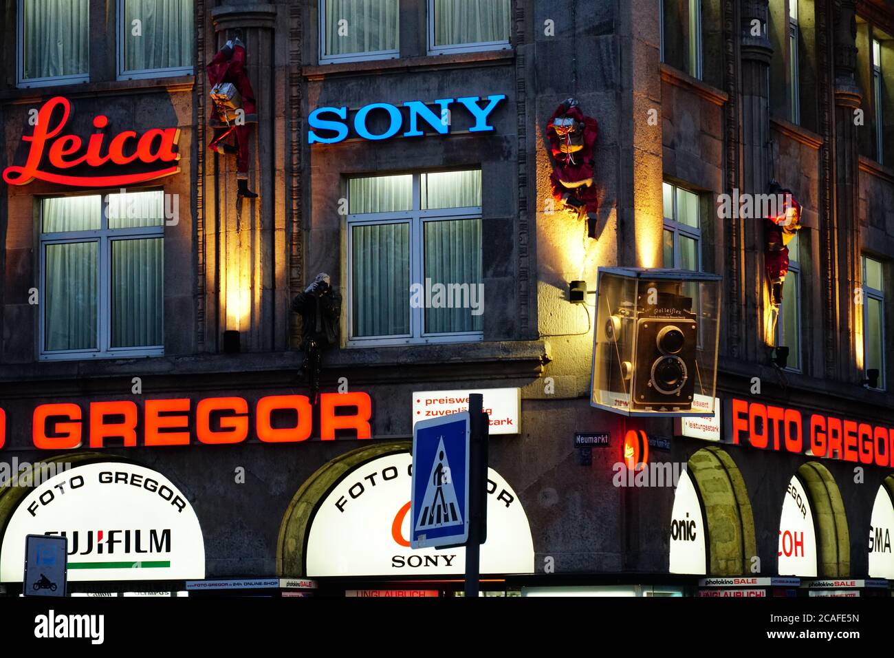 COLOGNE, GERMANY - Dec 15, 2019: advertisement of foto camera brands ...