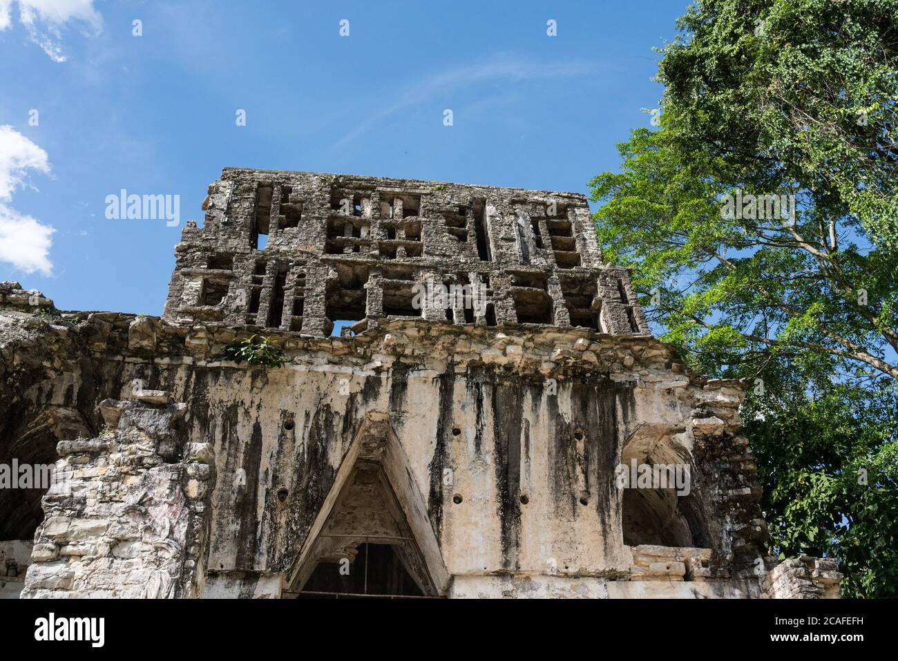 The roof comb on the Temple of the Cross in the ruins of the Mayan city ...