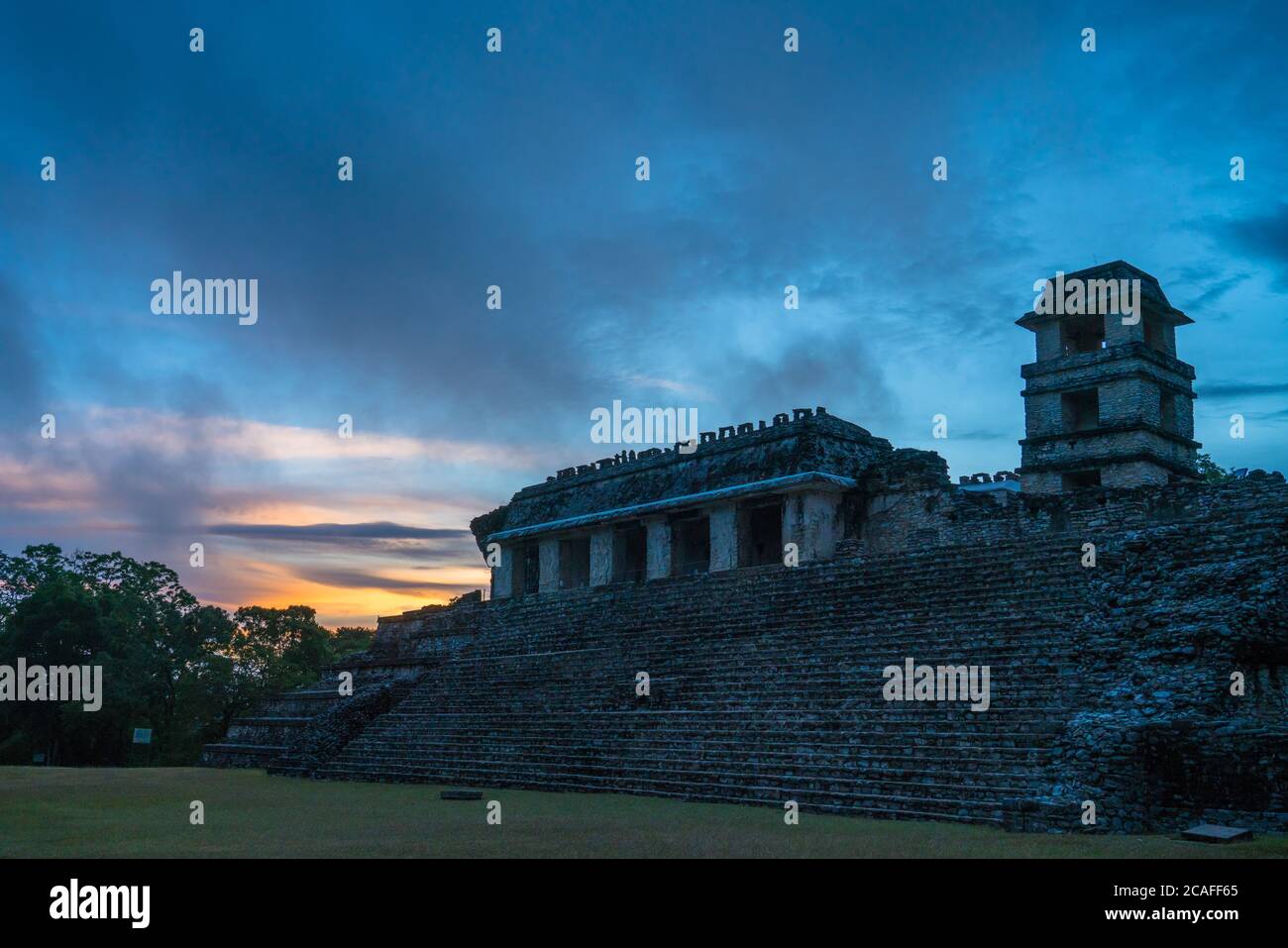 The Palace at sunrise in the ruins of the Mayan city of Palenque ...
