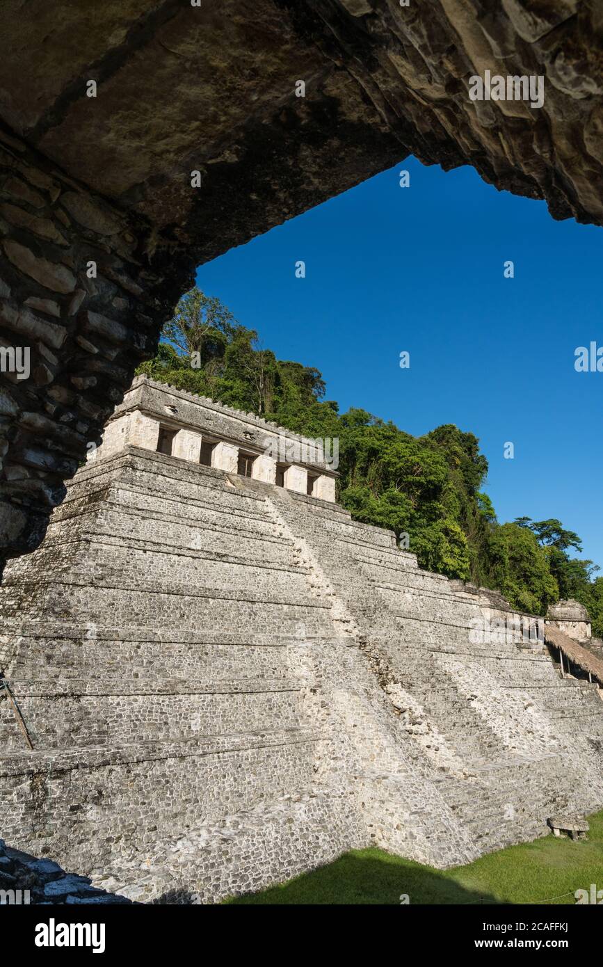 The Temple of the Inscriptions framed by an arch in the Palace at the ...