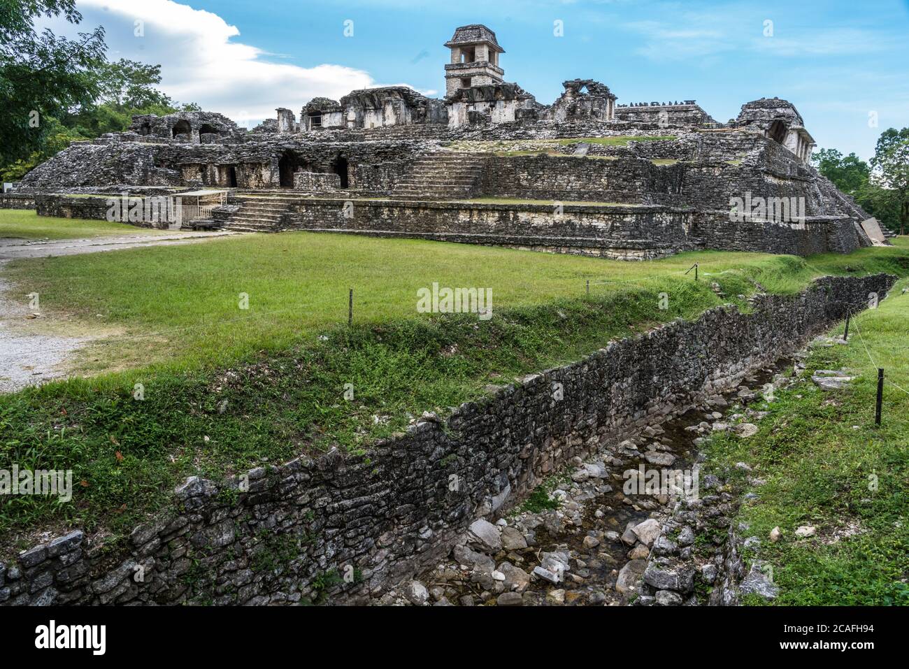 The Palace and the aqueduct in the ruins of the Mayan city of Palenque ...