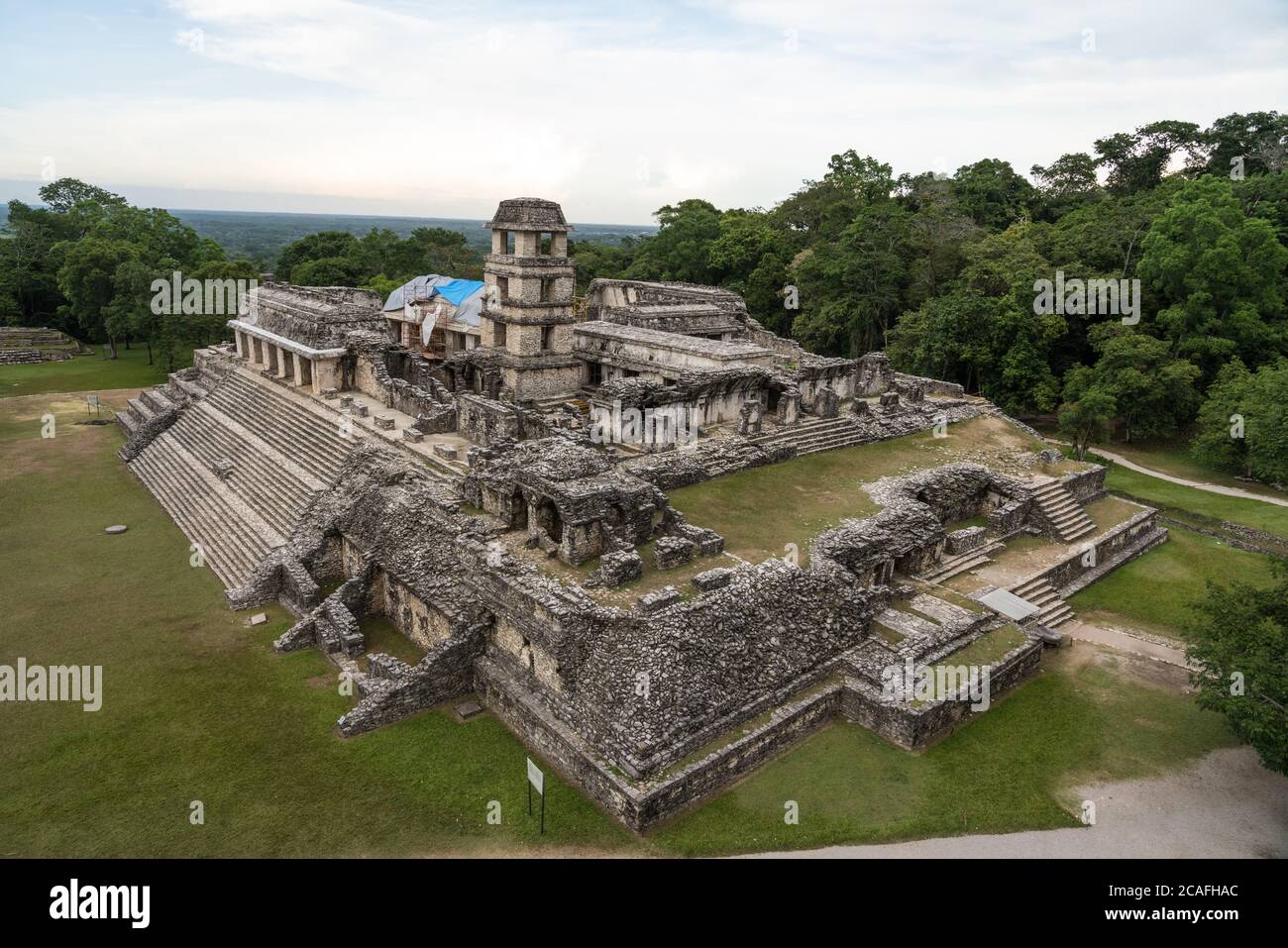 Restoration work on the Palace in the ruins of the Mayan city of ...