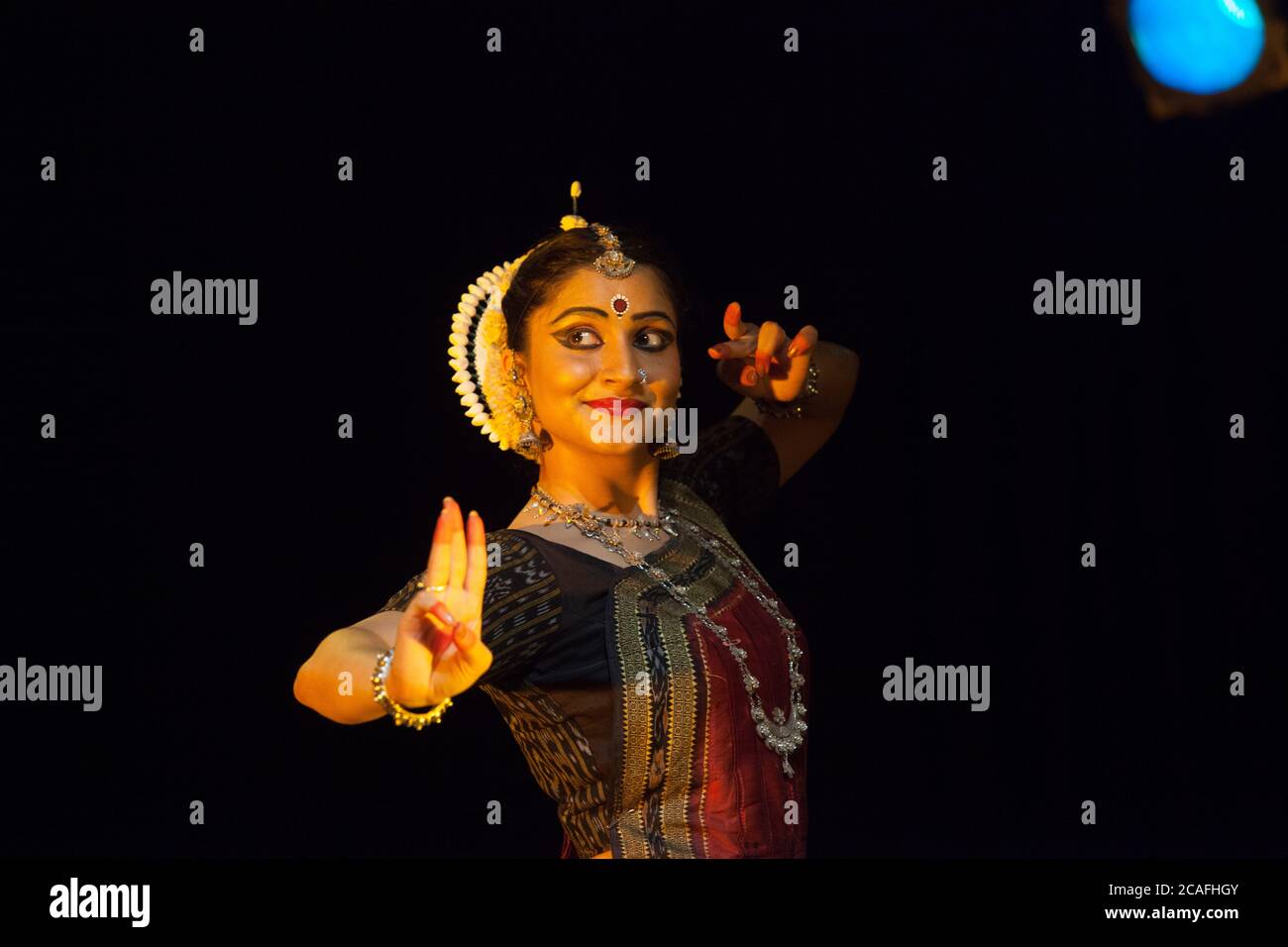 Woman performing odissi dance temple hi-res stock photography and ...