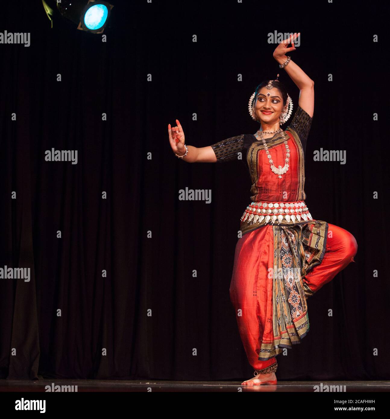 Woman performing odissi dance temple hi-res stock photography and ...