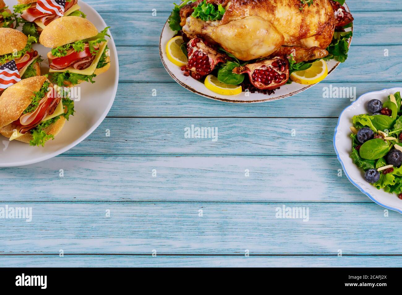 Party table with delicious food for celebrating american holiday ...