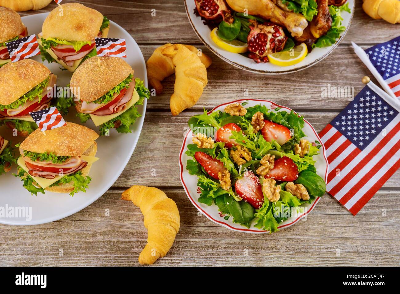 Party table with delicious food for celebrating american holiday ...