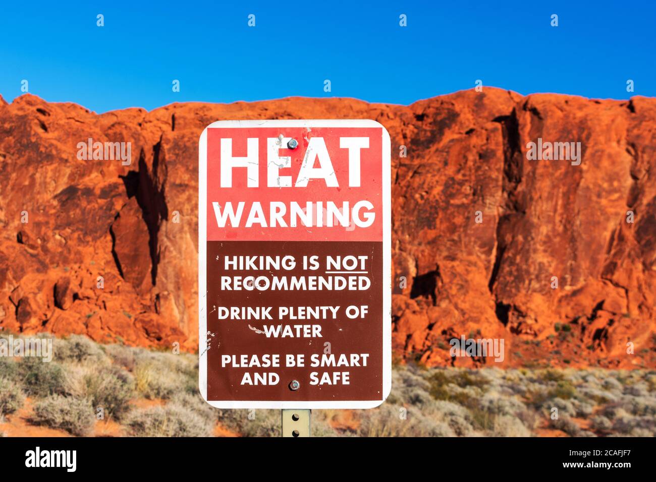 Heat warning sign informs tourists of the dangers of heat exhaustion ...