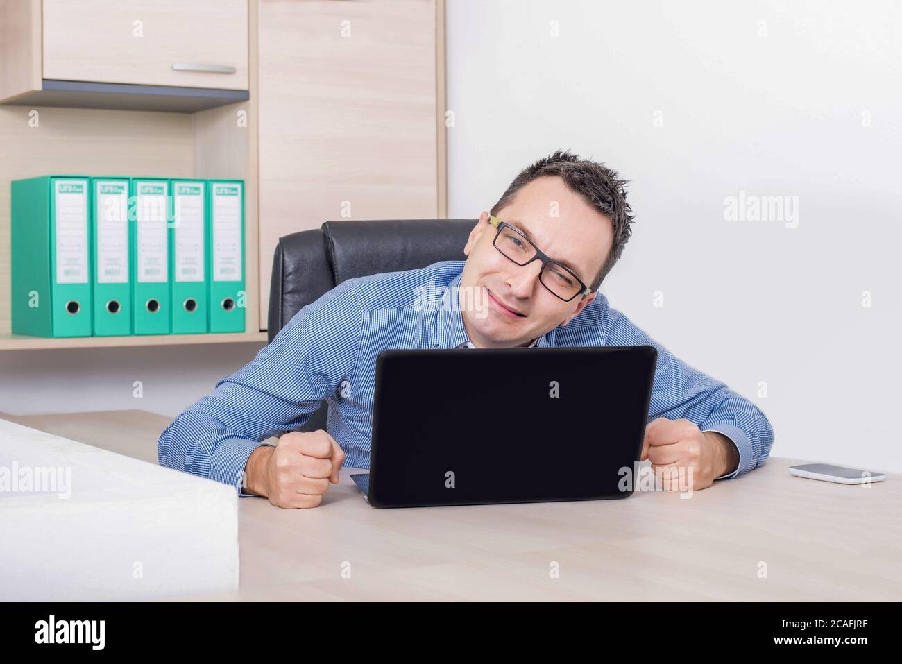 Angry man behind screen hi-res stock photography and images - Alamy
