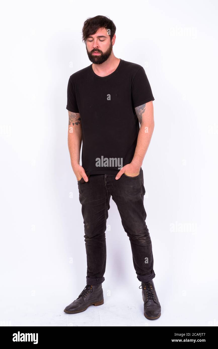 Portrait of handsome bearded man against white background Stock Photo ...