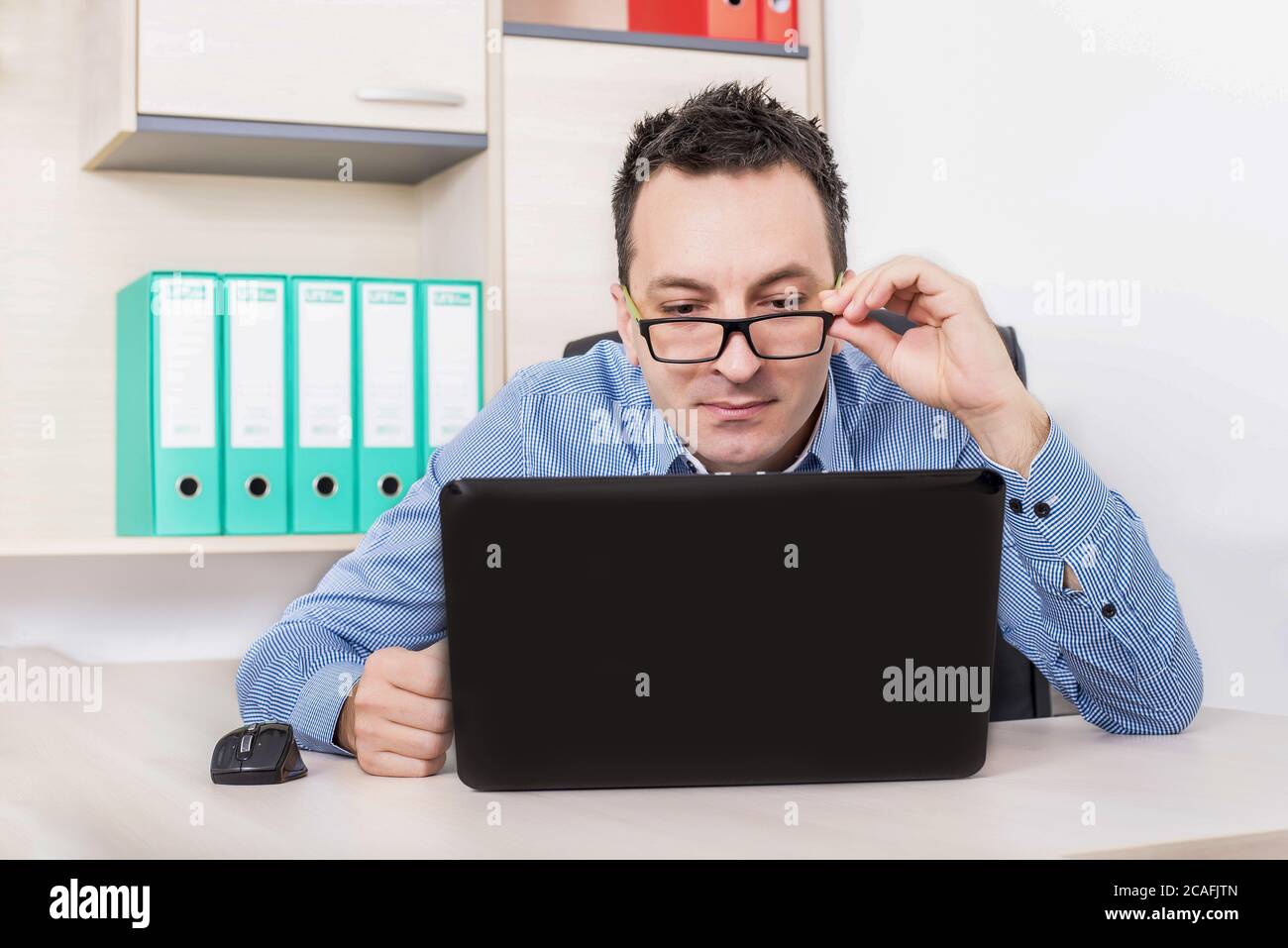 Person behind computer pc hi-res stock photography and images - Alamy