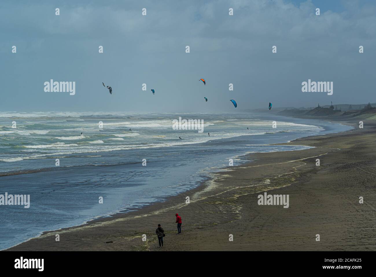 Kitesurfers ride on waves in hi-res stock photography and images - Alamy