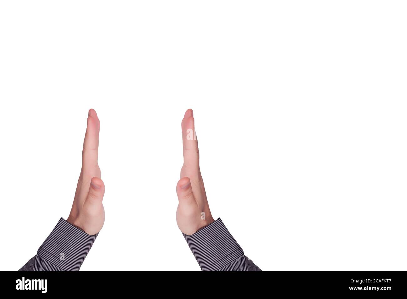 Selective focus shot of human hands holding nothing in a white ...