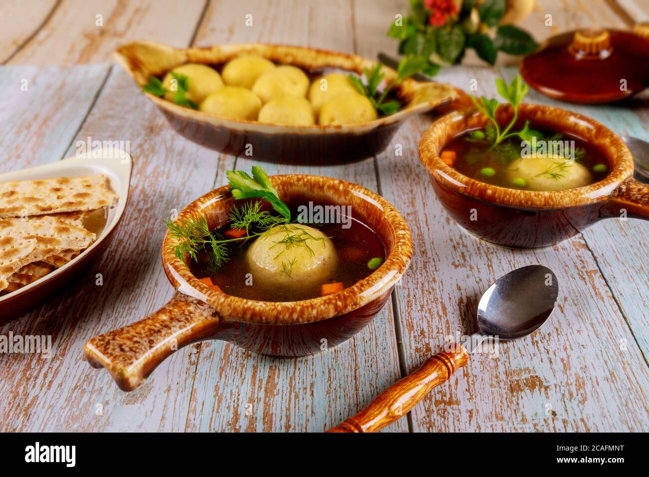 Traditional passover meal. matzo ball soup, matzoh and matzo balls ...