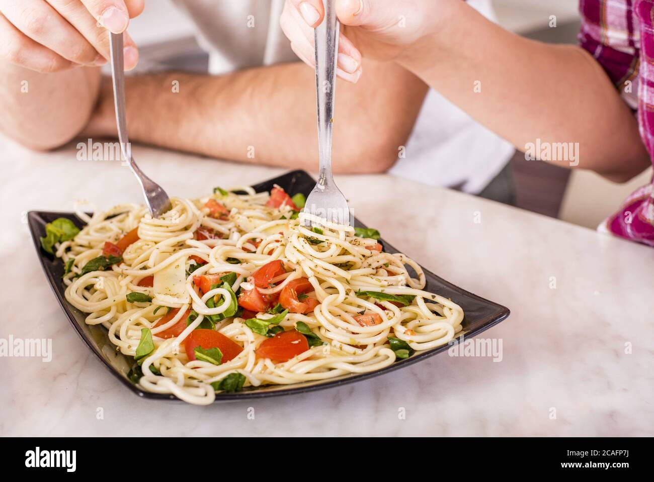 Man eating pasta vegetables not woman hi-res stock photography and ...