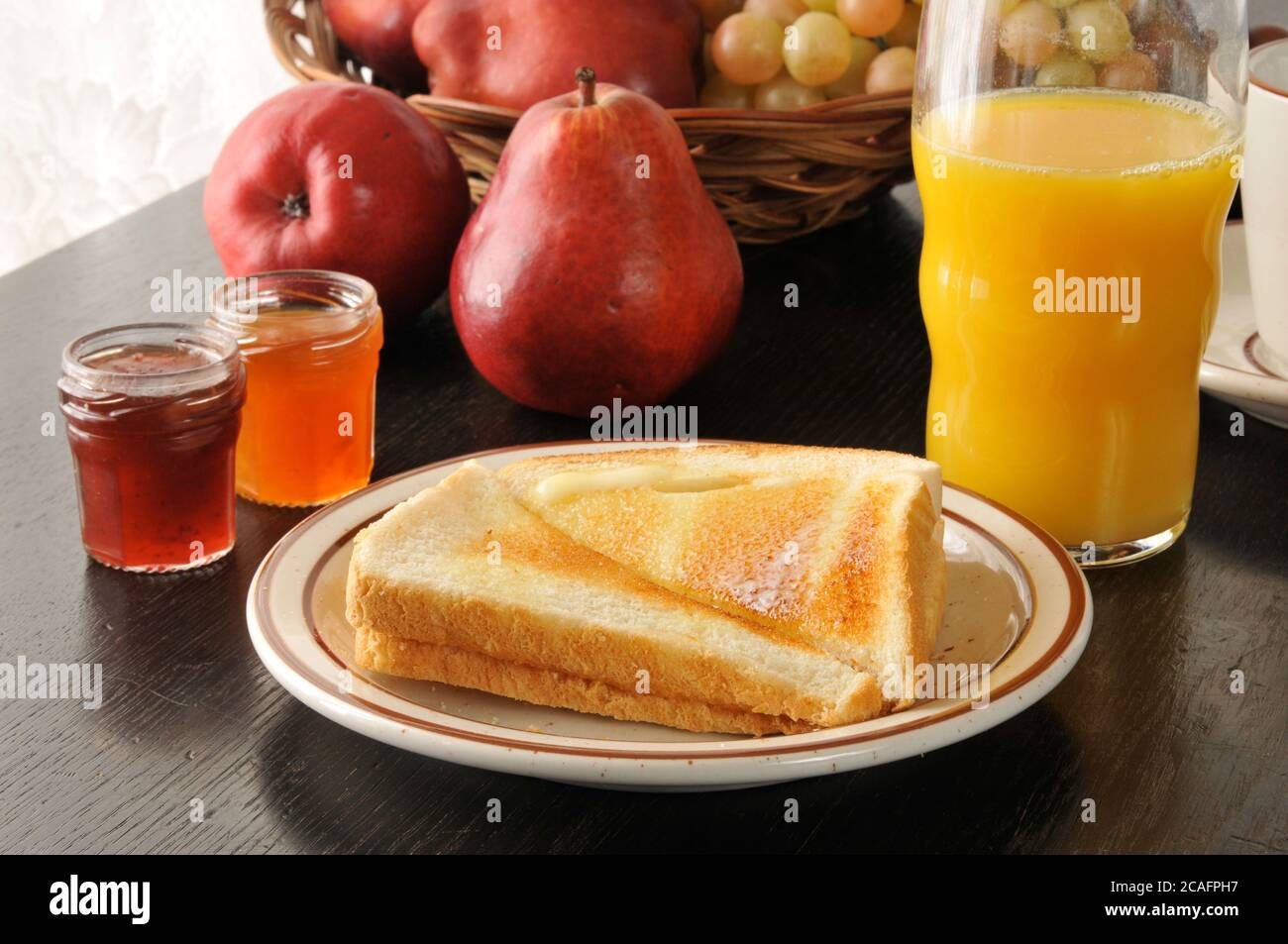 Buttered toast with jam hi-res stock photography and images - Alamy