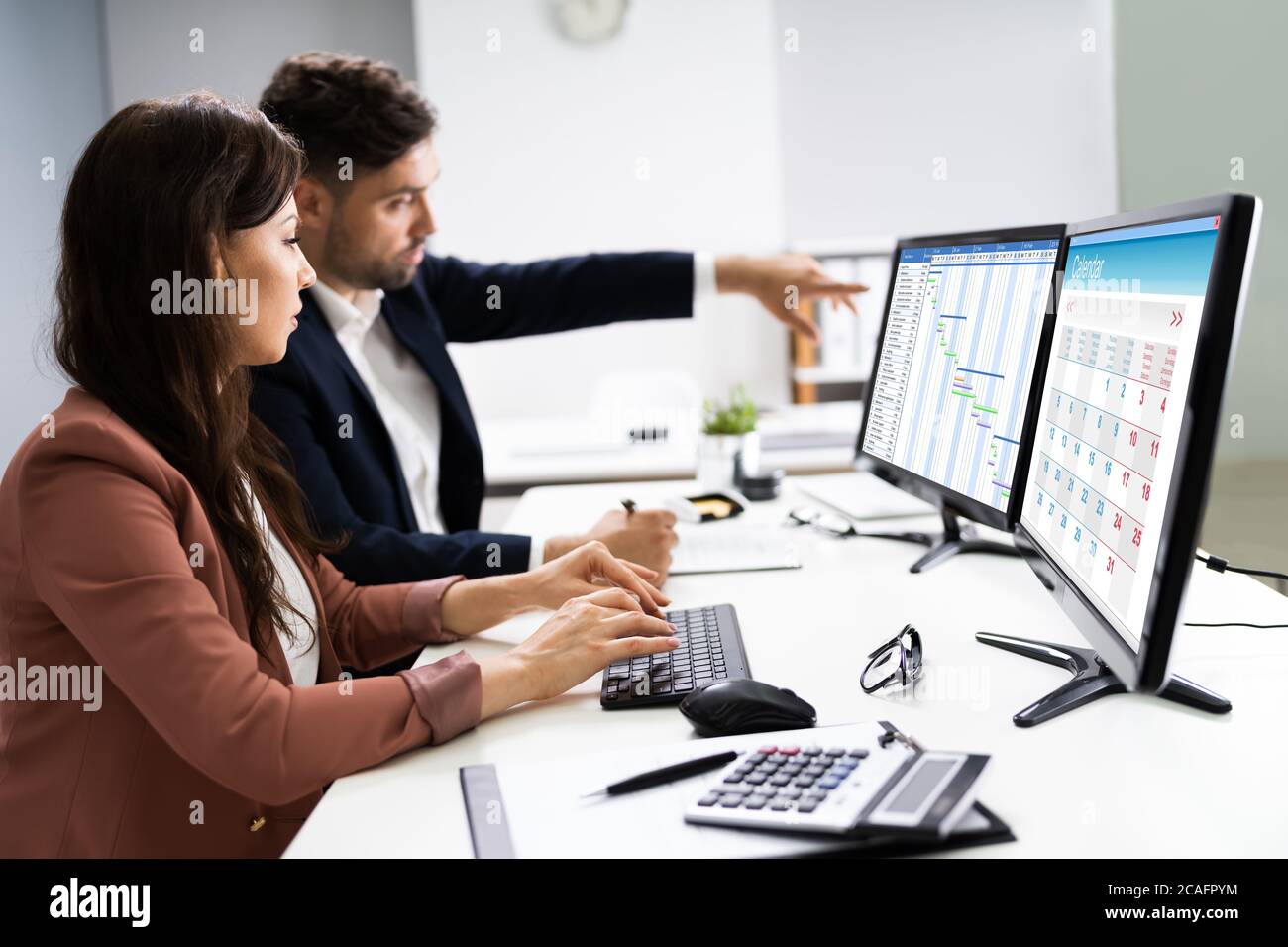 Business Schedule And Calendar Planner Using Computer In Office Stock ...