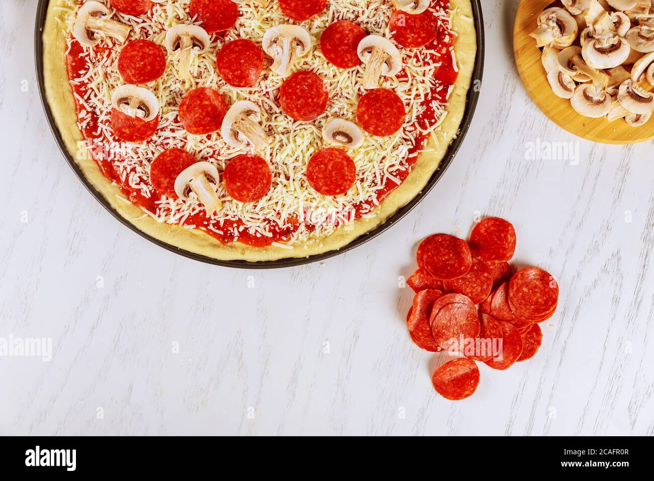 Pizza gourmet round uncooked hi-res stock photography and images - Alamy