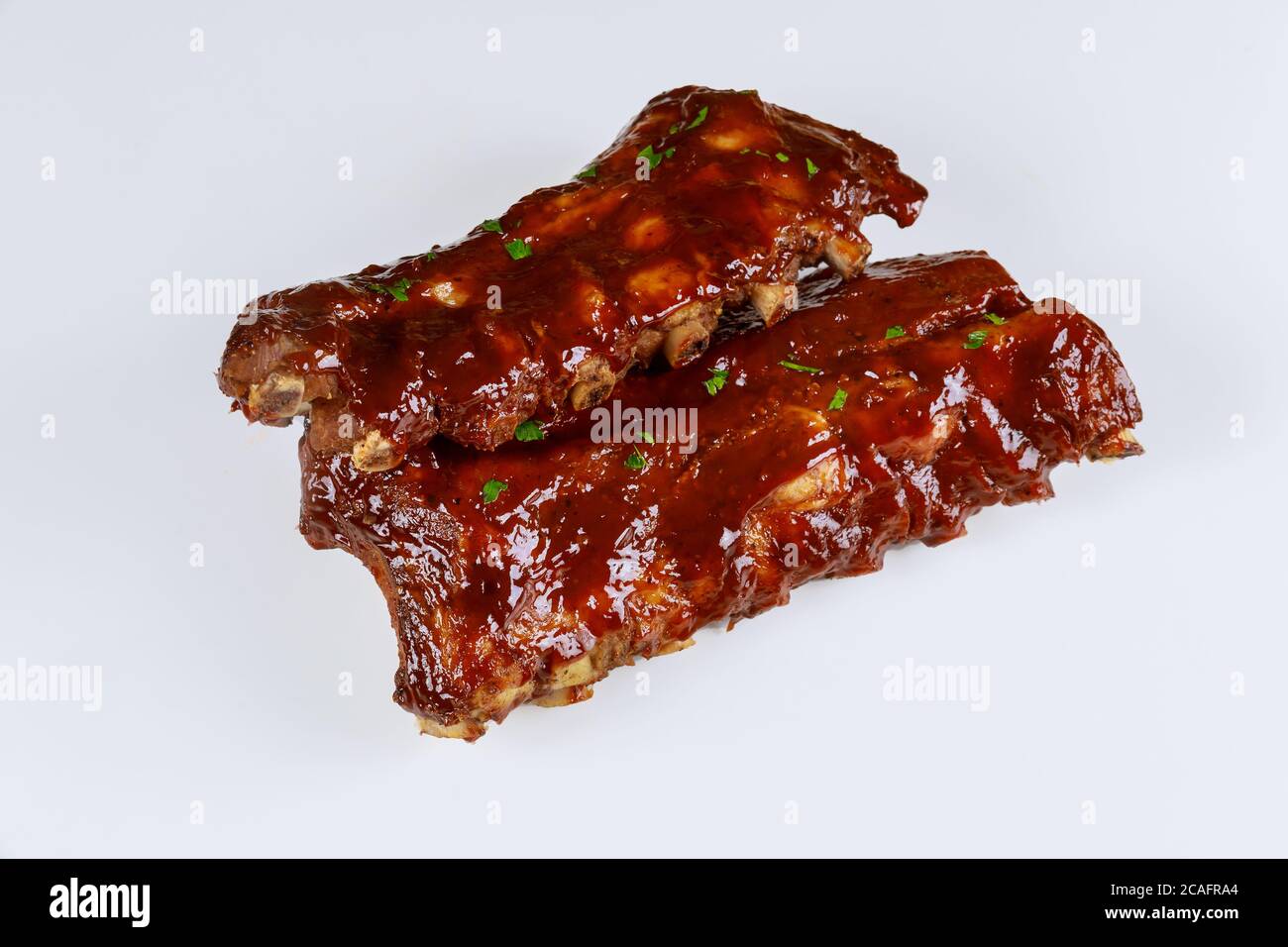 Hickory smoked barbecue beef ribs on isolated white background Stock ...