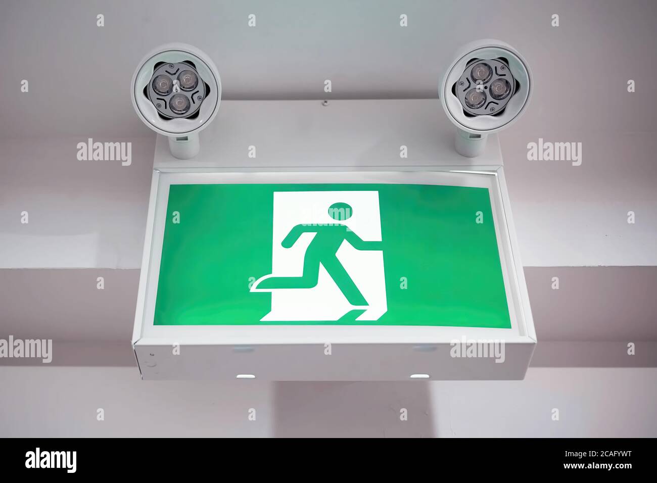 Running man emergency exit sign hi-res stock photography and images - Alamy