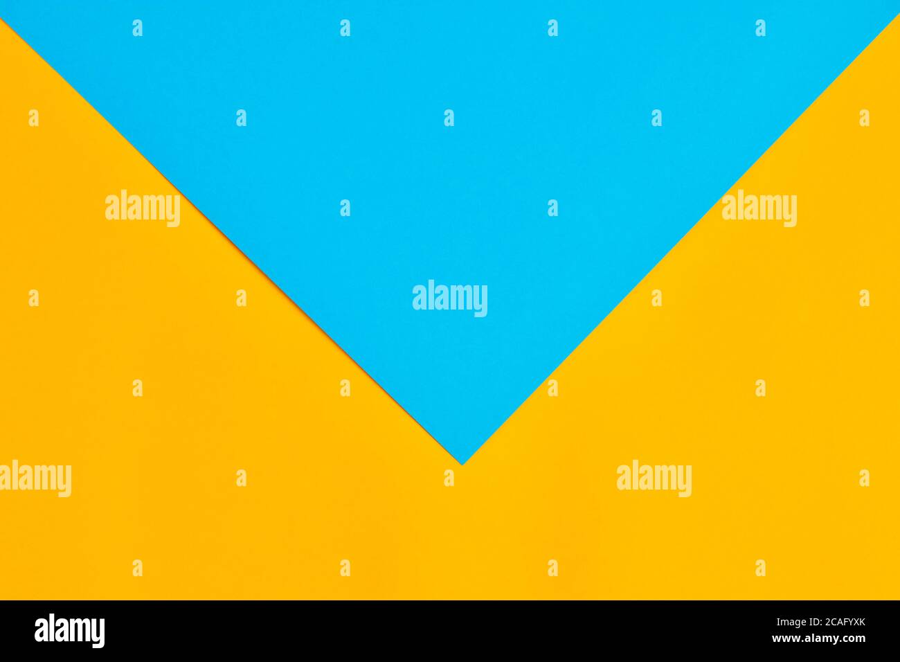 Blue and yellow colored envelope back or rear close up view Stock Photo ...