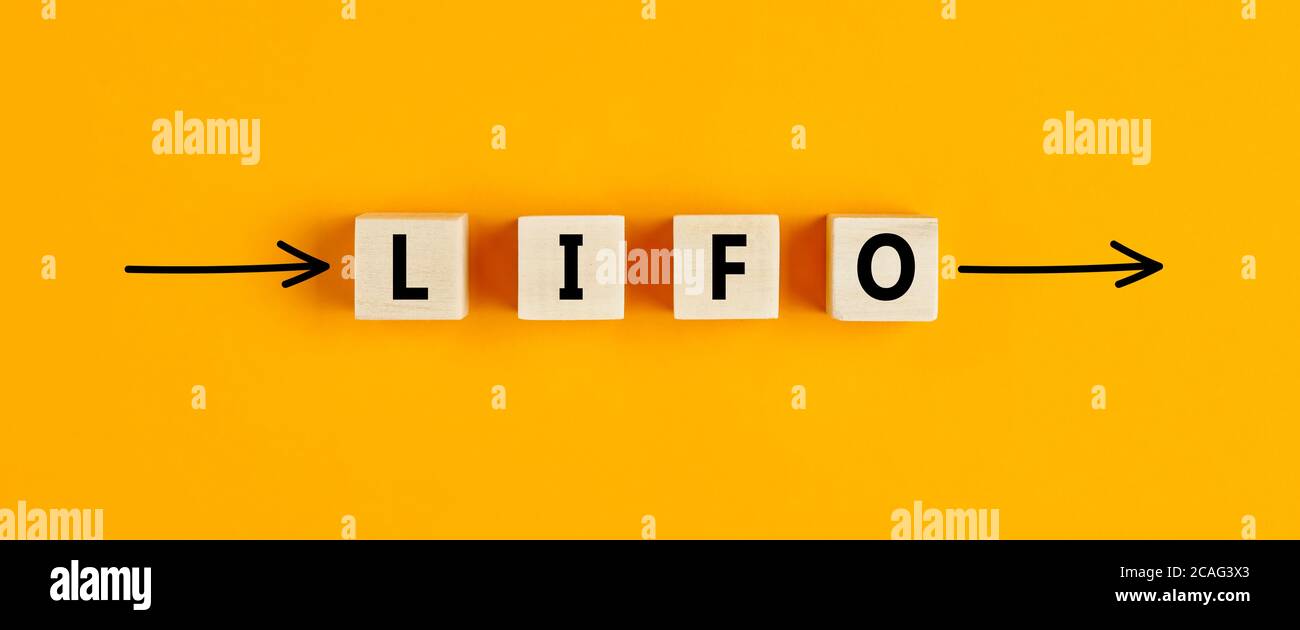 The business abbreviation lifo (last in first out) written on wooden ...
