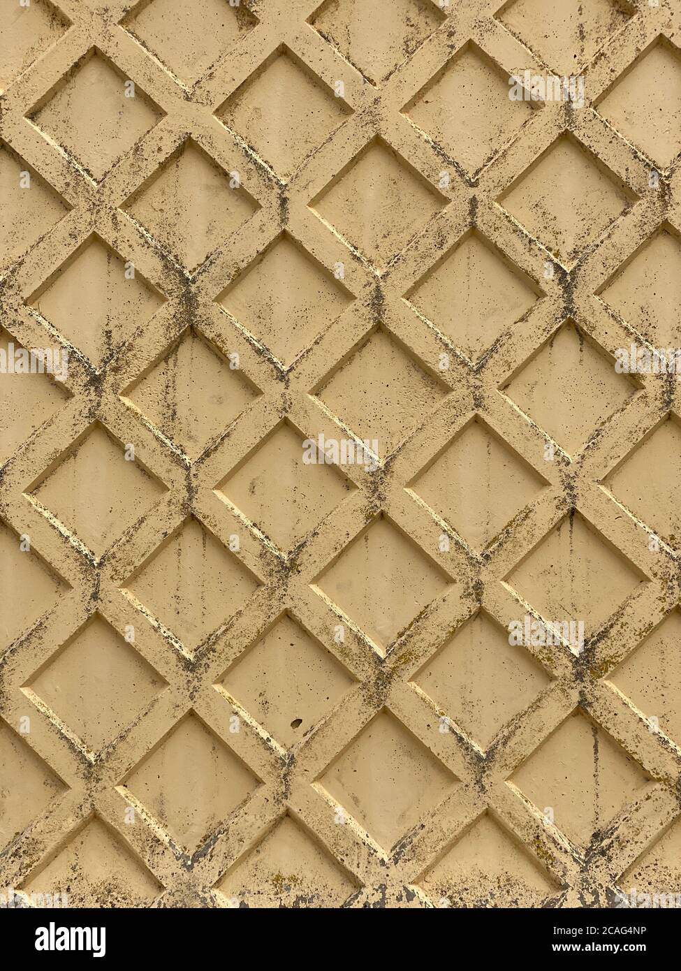 old concrete wall with embossed diamond pattern Stock Photo - Alamy