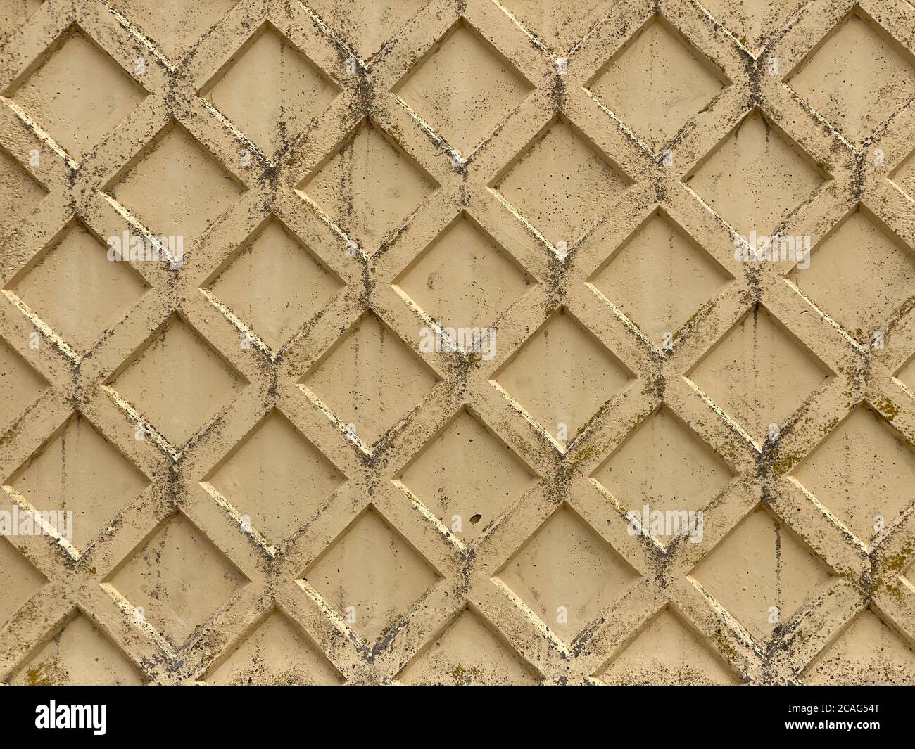 old concrete wall with embossed diamond pattern Stock Photo - Alamy