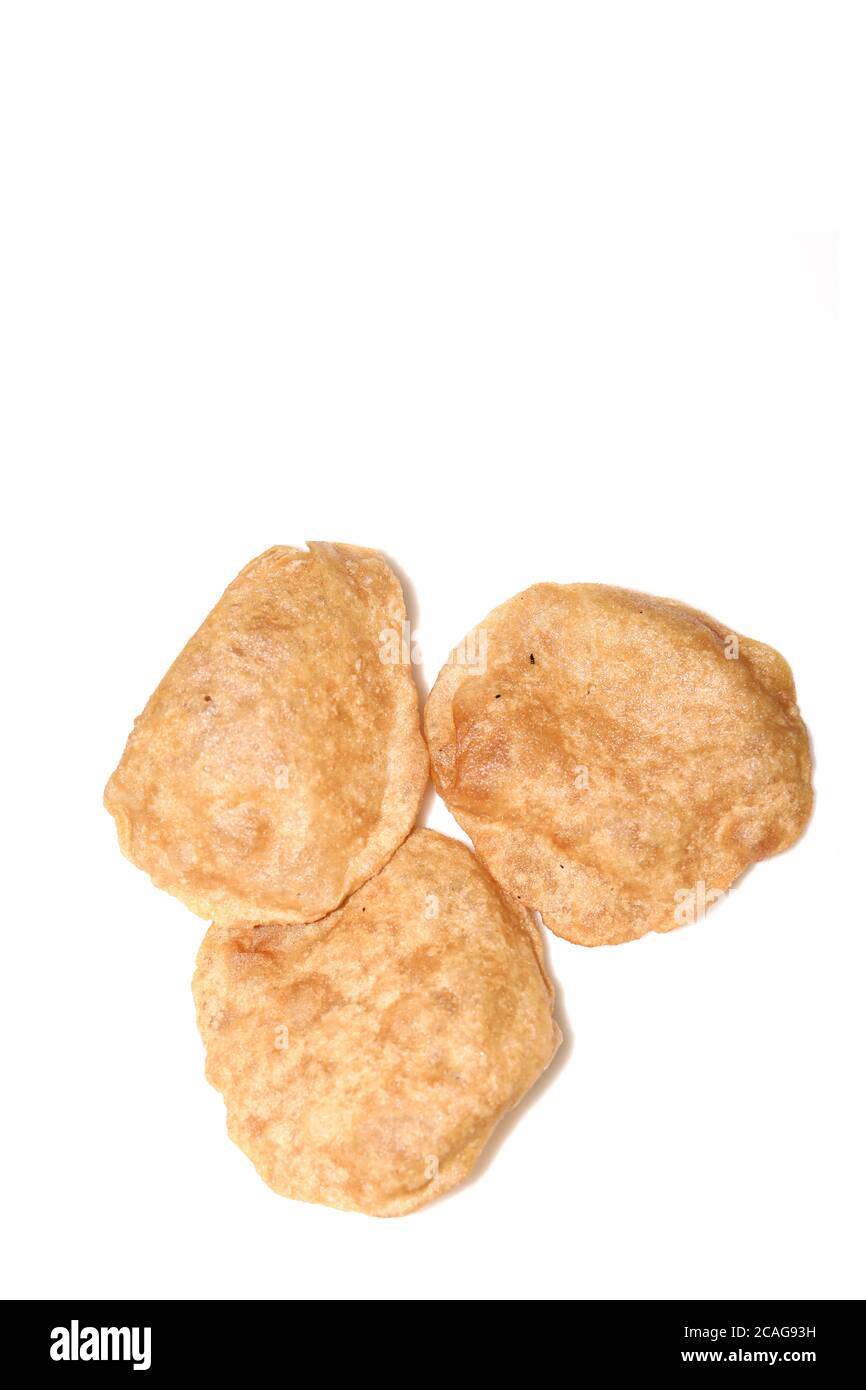 Indian fried puri bread Cut Out Stock Images & Pictures - Alamy