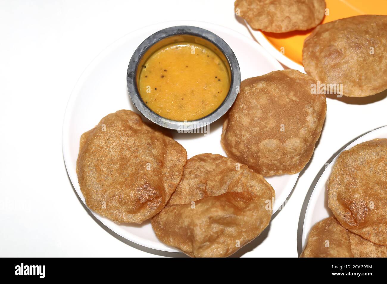 Indian dish poori/puri with aloo in white background Stock Photo - Alamy