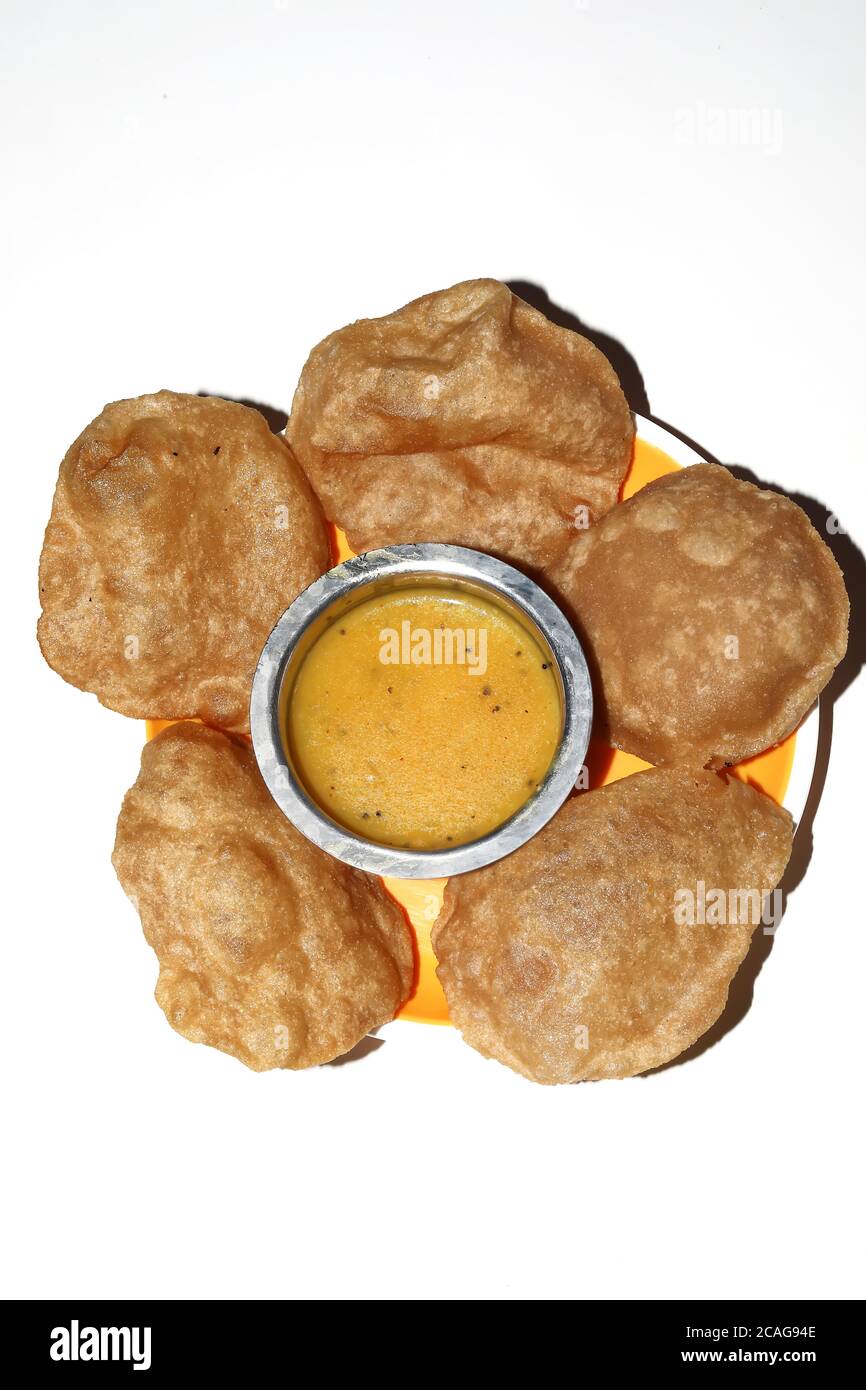 Indian dish poori/puri with aloo in white background Stock Photo - Alamy