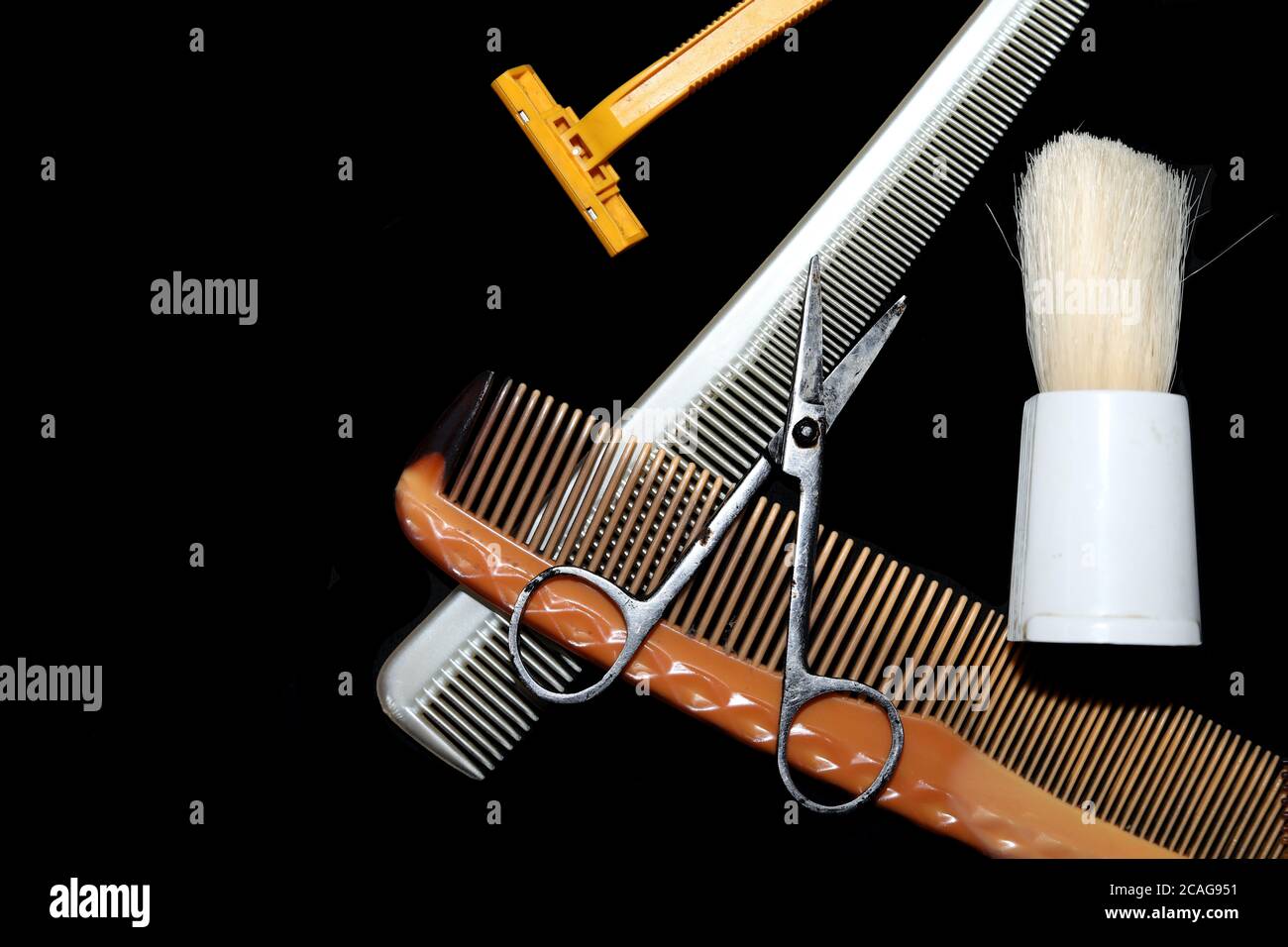 Tools for cutting beard barbershop on black backgrounds Stock Photo - Alamy