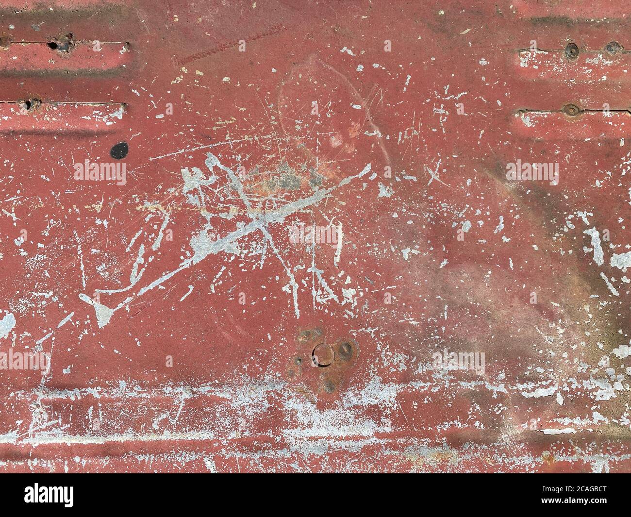 old scratched red painted metal surface background Stock Photo - Alamy