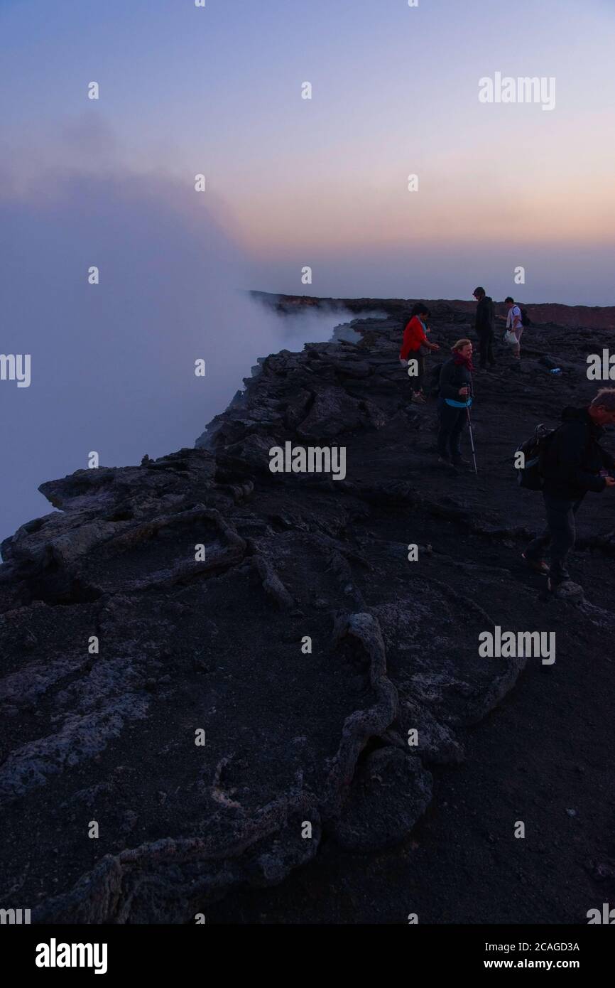 Erta Ale, Ethiopia - Nov 2018: Group of people at the edge of Erta Ale ...