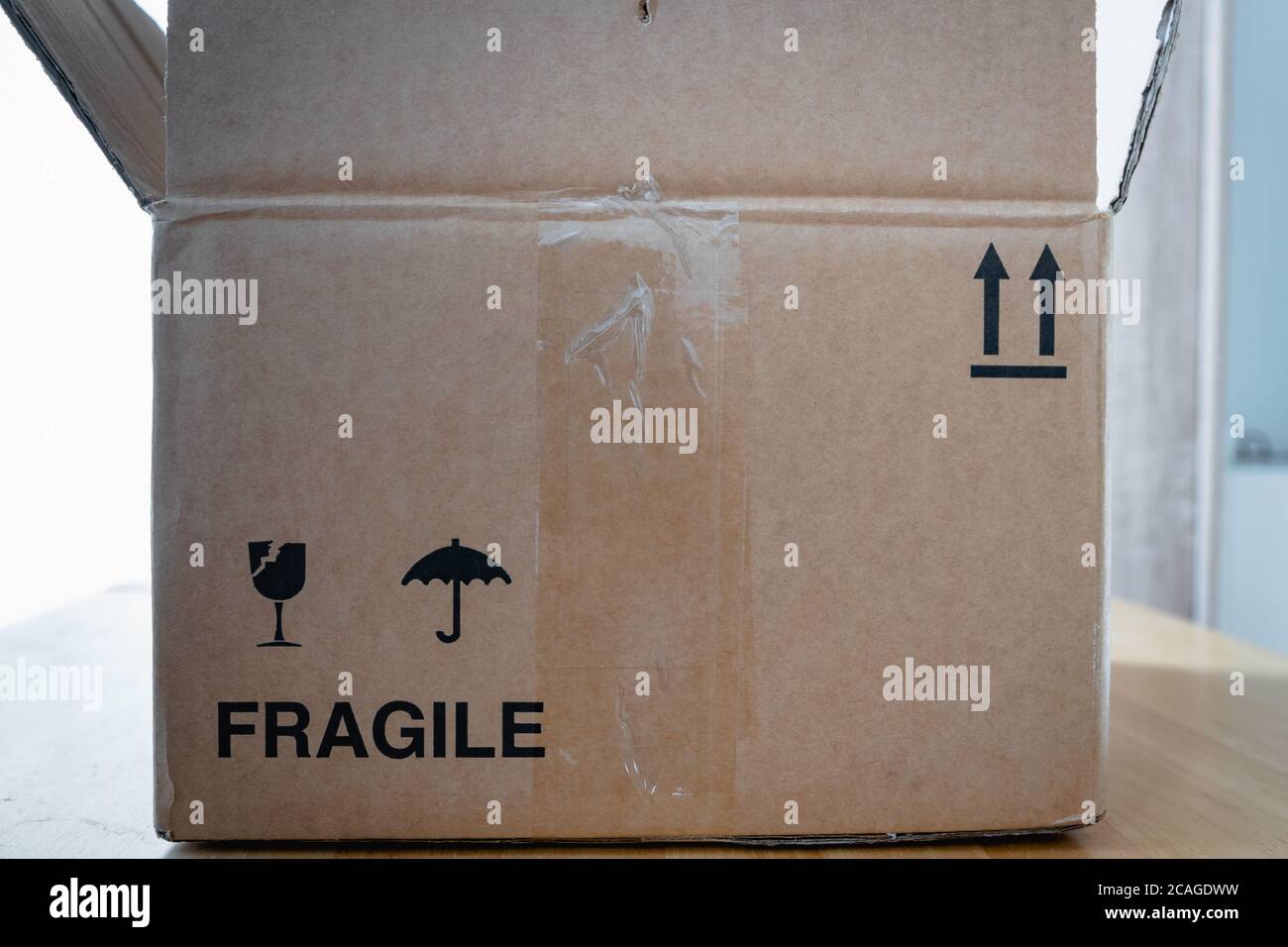 parcel box with fragile warning symbol - selective focus at the ...