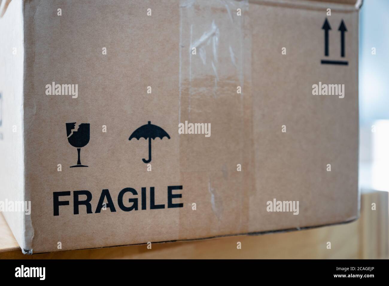 parcel box with fragile warning symbol - selective focus at the ...