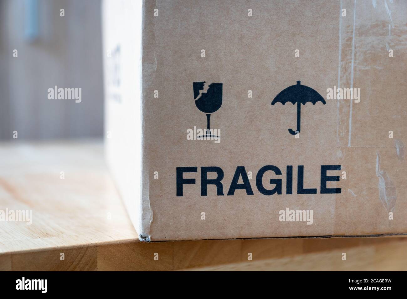 parcel box with fragile warning symbol - selective focus at the ...