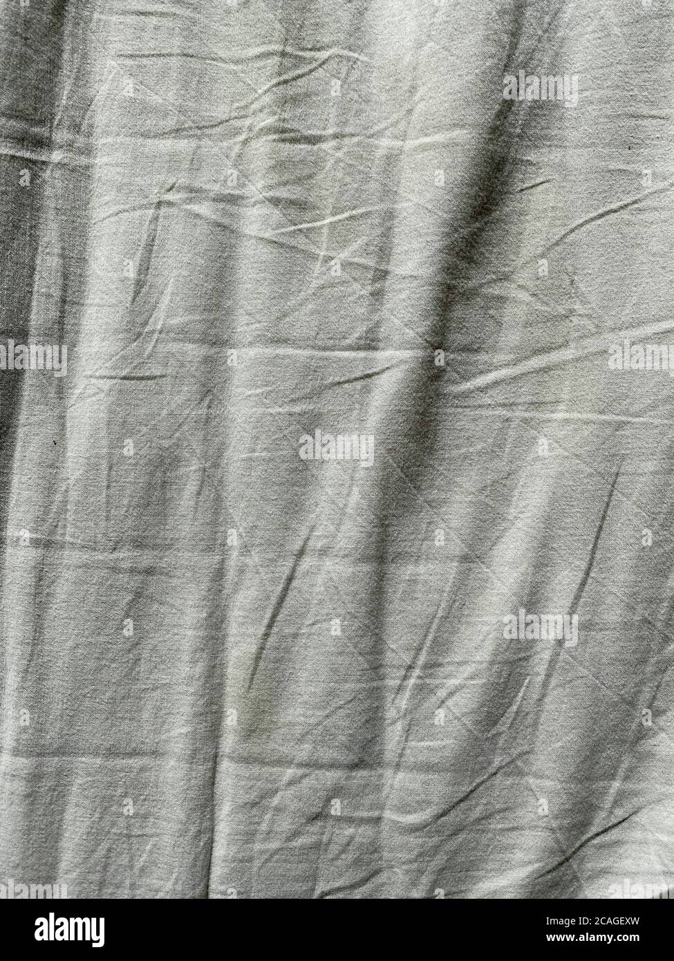 Background Of Crumpled Dense Fabric Stock Photo - Alamy