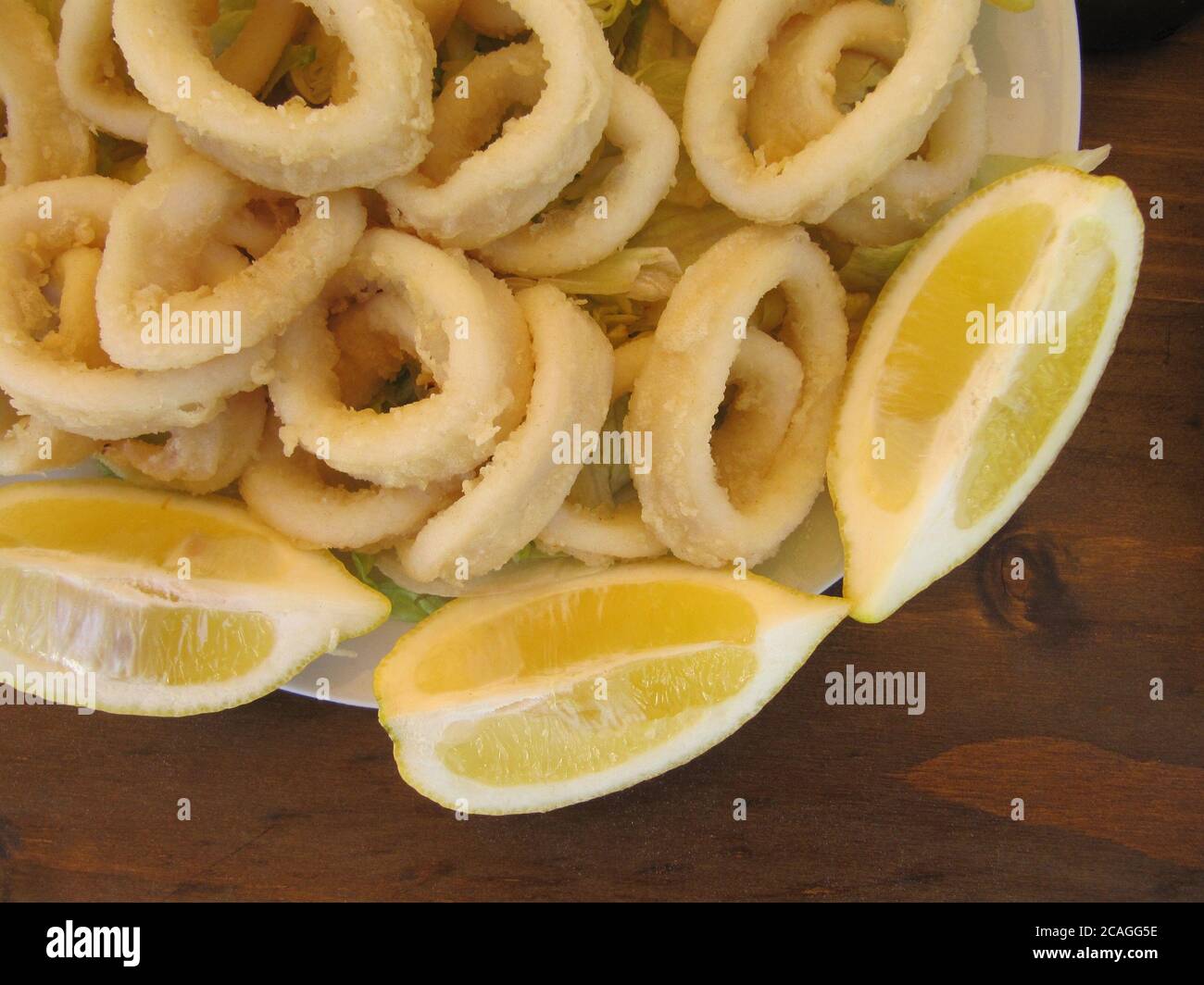 Breaded squid plate Stock Photo - Alamy