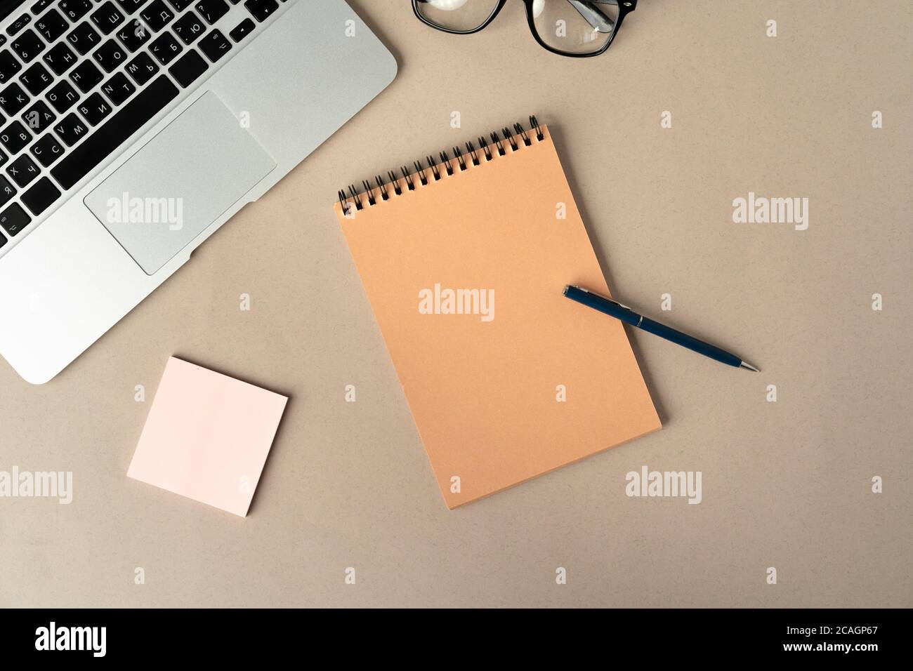 Open laptop with blank notebook, view from above. Workplace concept ...