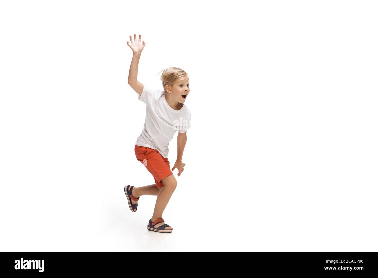 Energy. Happy kids, little and emotional caucasian boy jumping and ...