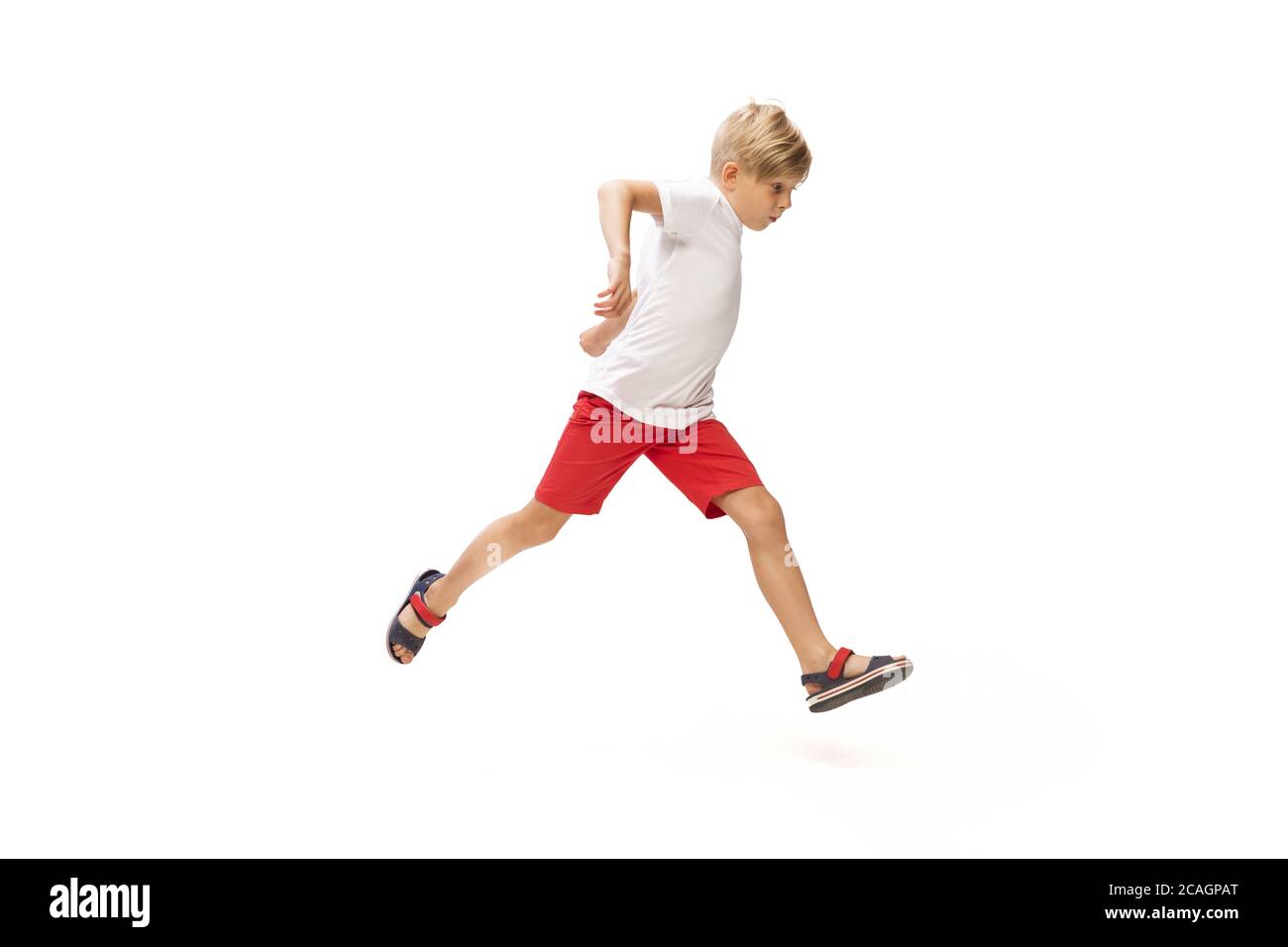 Target. Happy kids, little and emotional caucasian boy jumping and ...