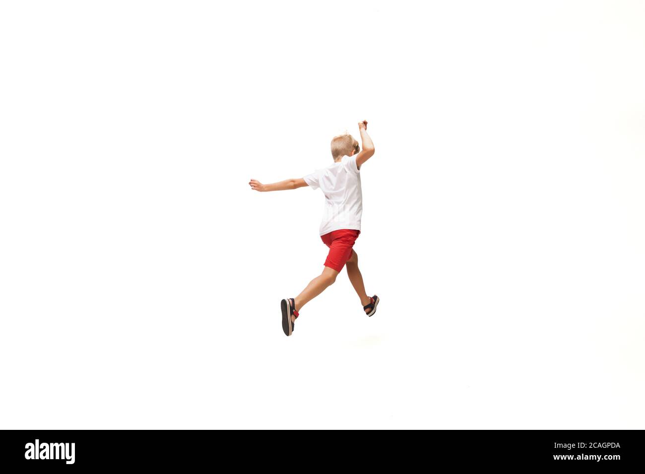 Target. Happy kids, little and emotional caucasian boy jumping and ...