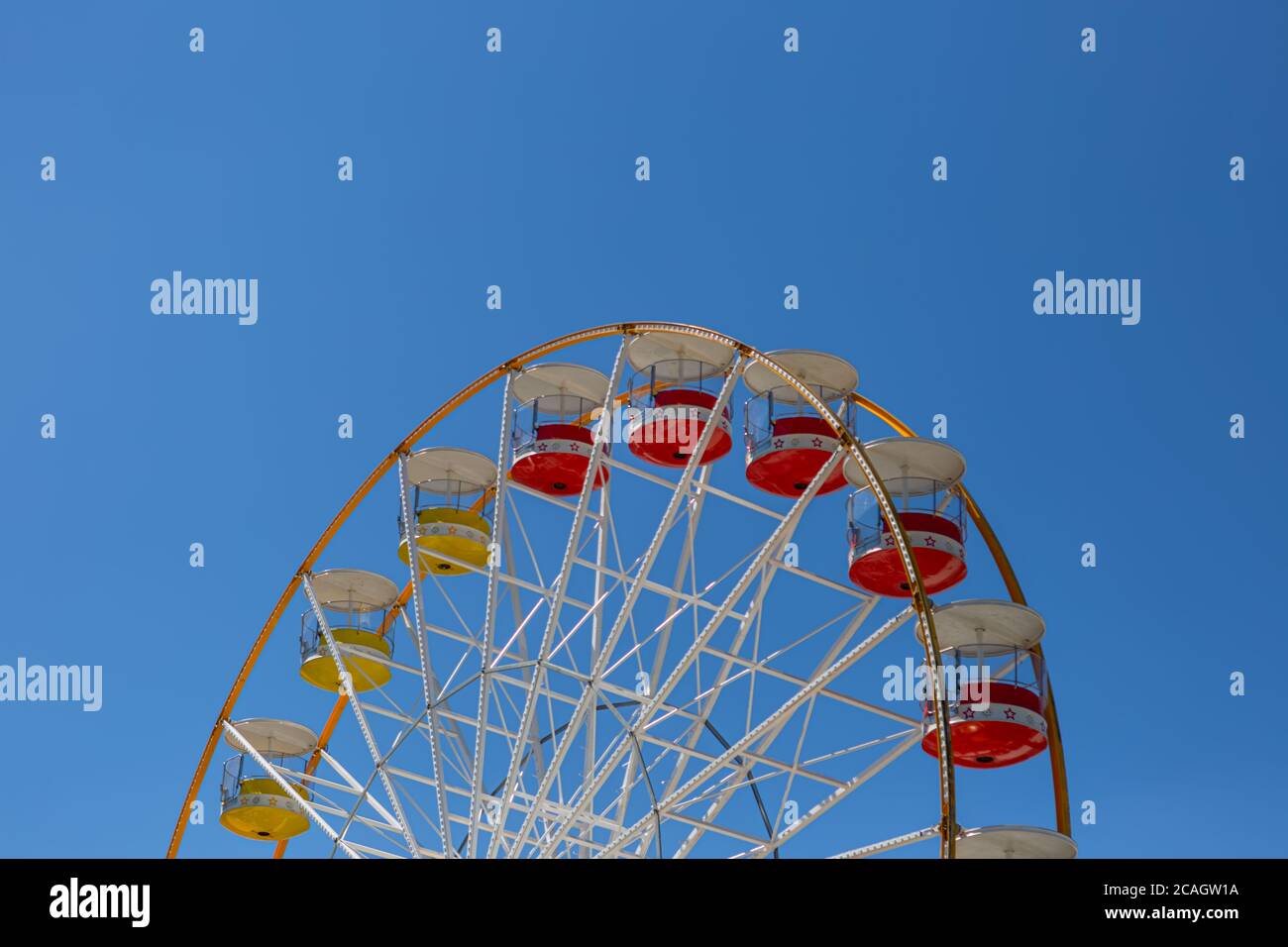 Giant ferris wheel with chairs, metallic structure, recreational ...