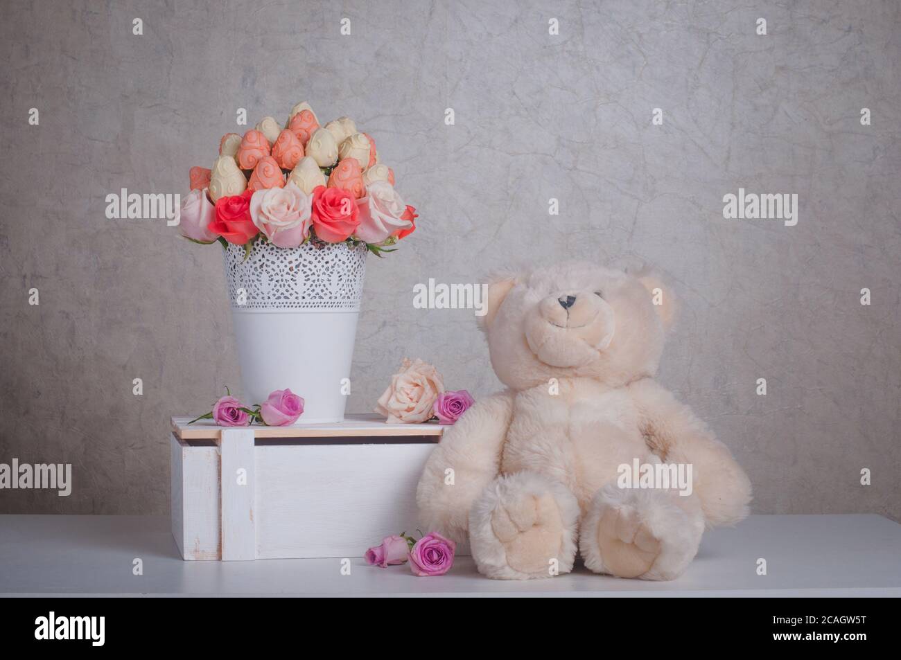 Fruit bouquet decoration with teddy bear toy on the table Stock Photo ...