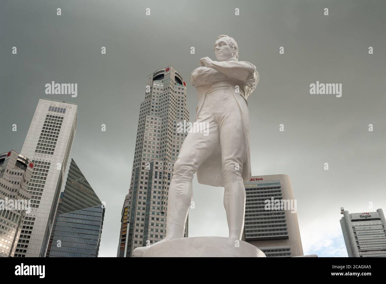 02.07.2020, Singapore, , Singapore - Dark clouds hang over the statue of Sir Thomas Stamford ...