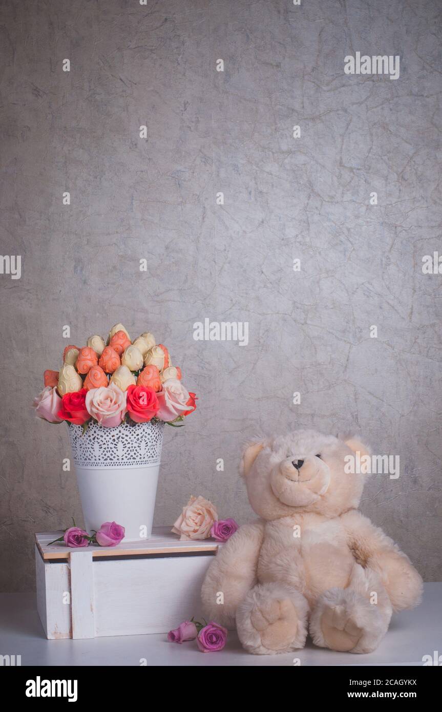 Fruit bouquet decoration with teddy bear toy on the table Stock Photo ...