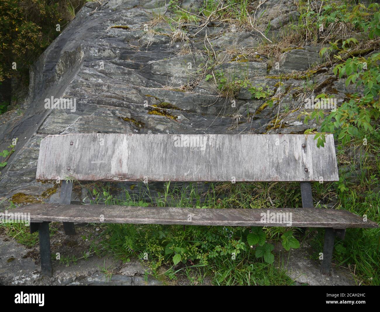 Old Bench On a Country Road Stock Photo - Alamy