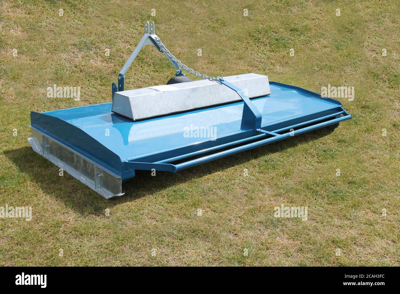 An Agricultural Grass Cutting Topper Tractor Trailer Stock Photo - Alamy